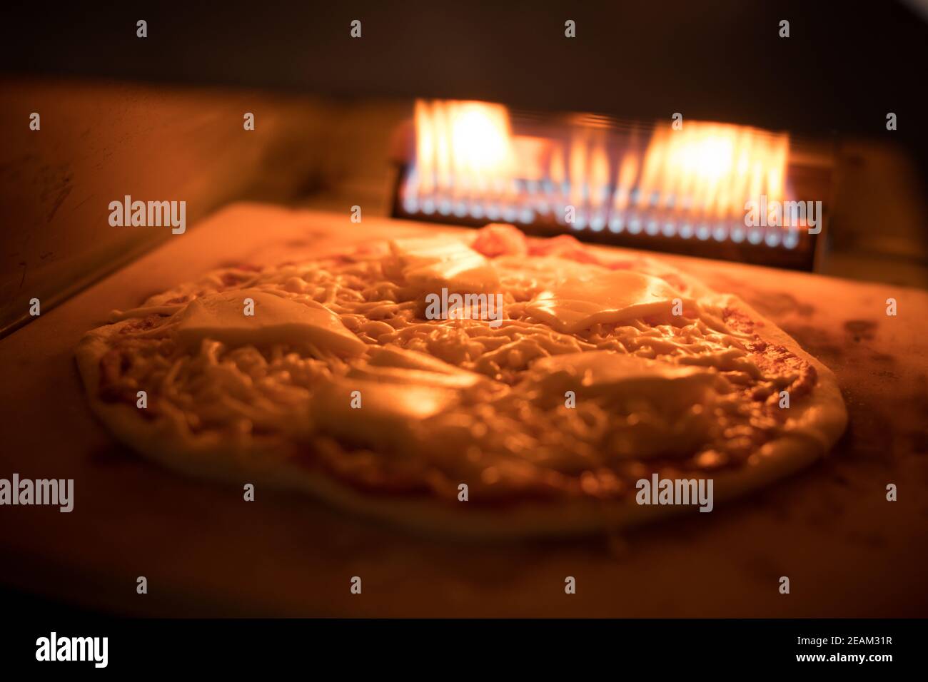 Baking pizza in oven close hi-res stock photography and images - Alamy