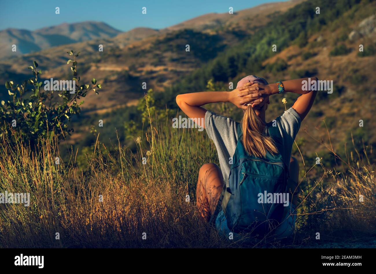 Girl sitting side view hi-res stock photography and images - Alamy