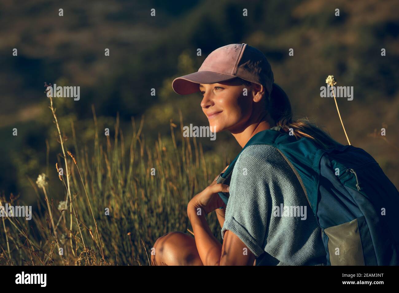 Girl backpack enjoying view mountain hi-res stock photography and ...