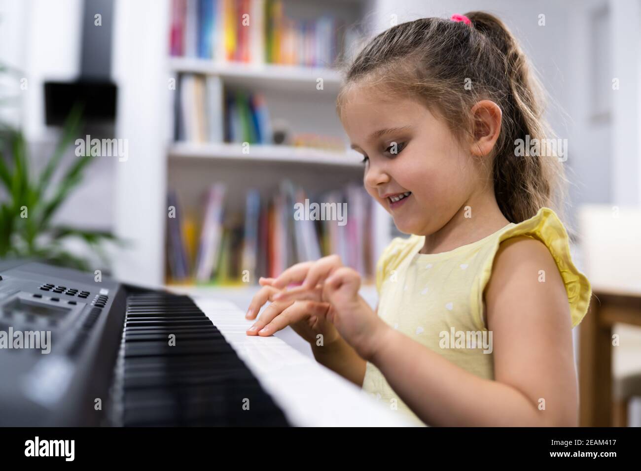Child keyboard hi-res stock photography and images - Alamy