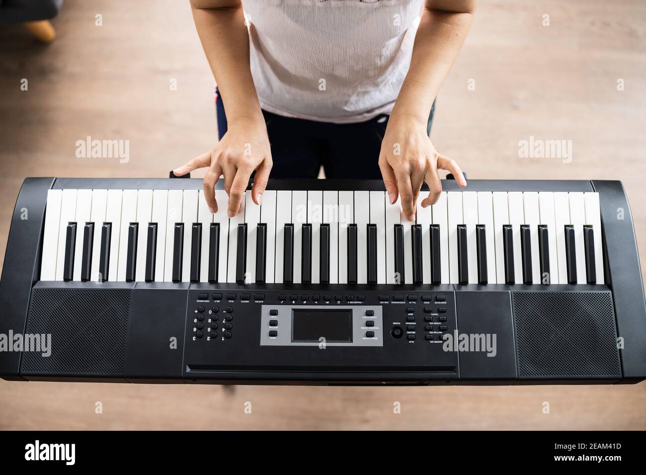 Woman Playing Music Keyboard Piano Stock Photo - Alamy