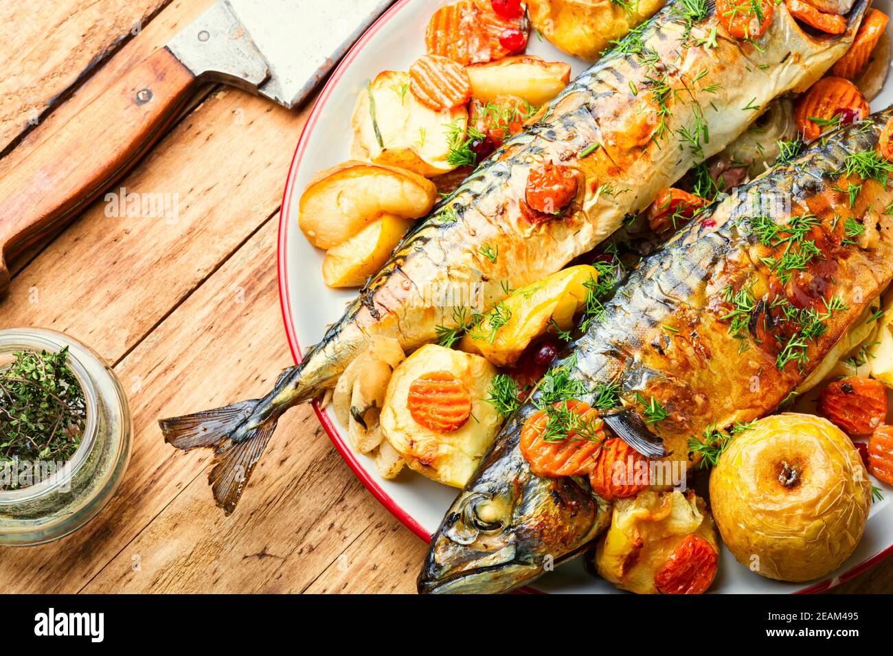 Baked fish with apple Stock Photo - Alamy