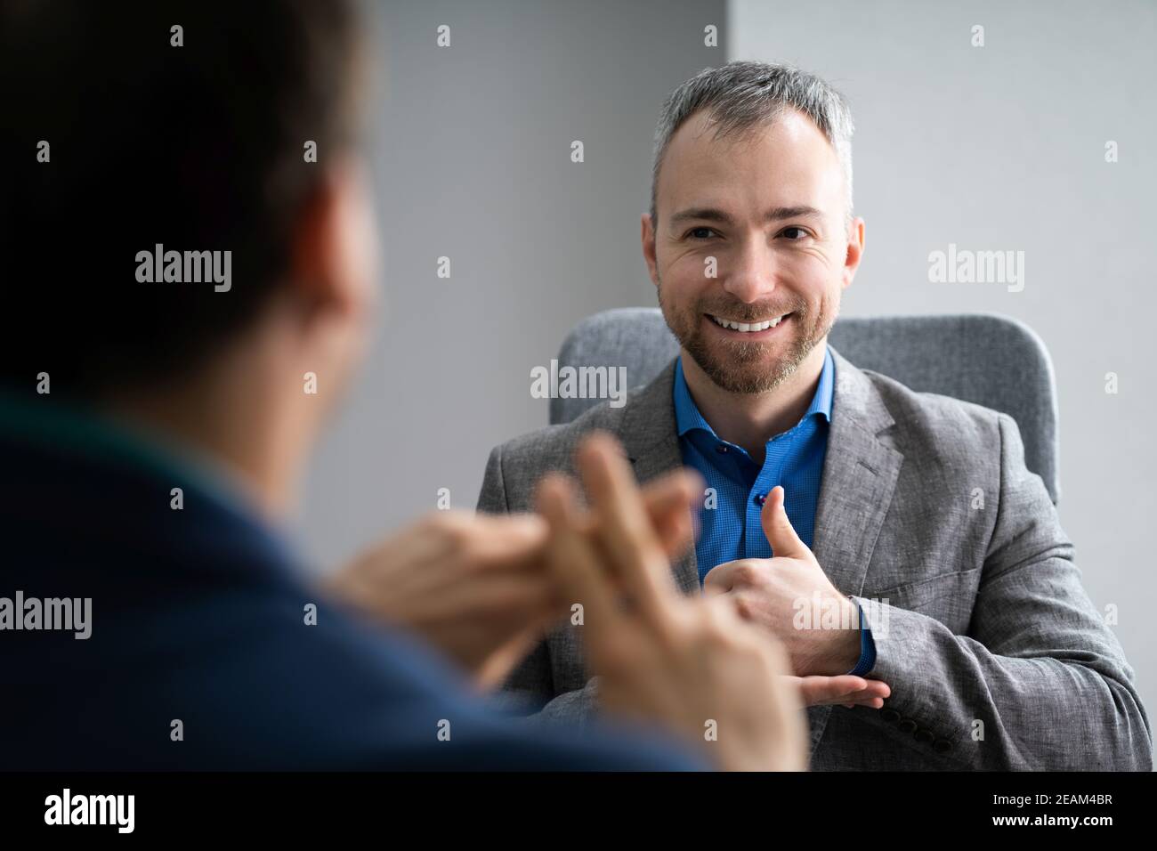 Learning Sign Language For Deaf Stock Photo - Alamy
