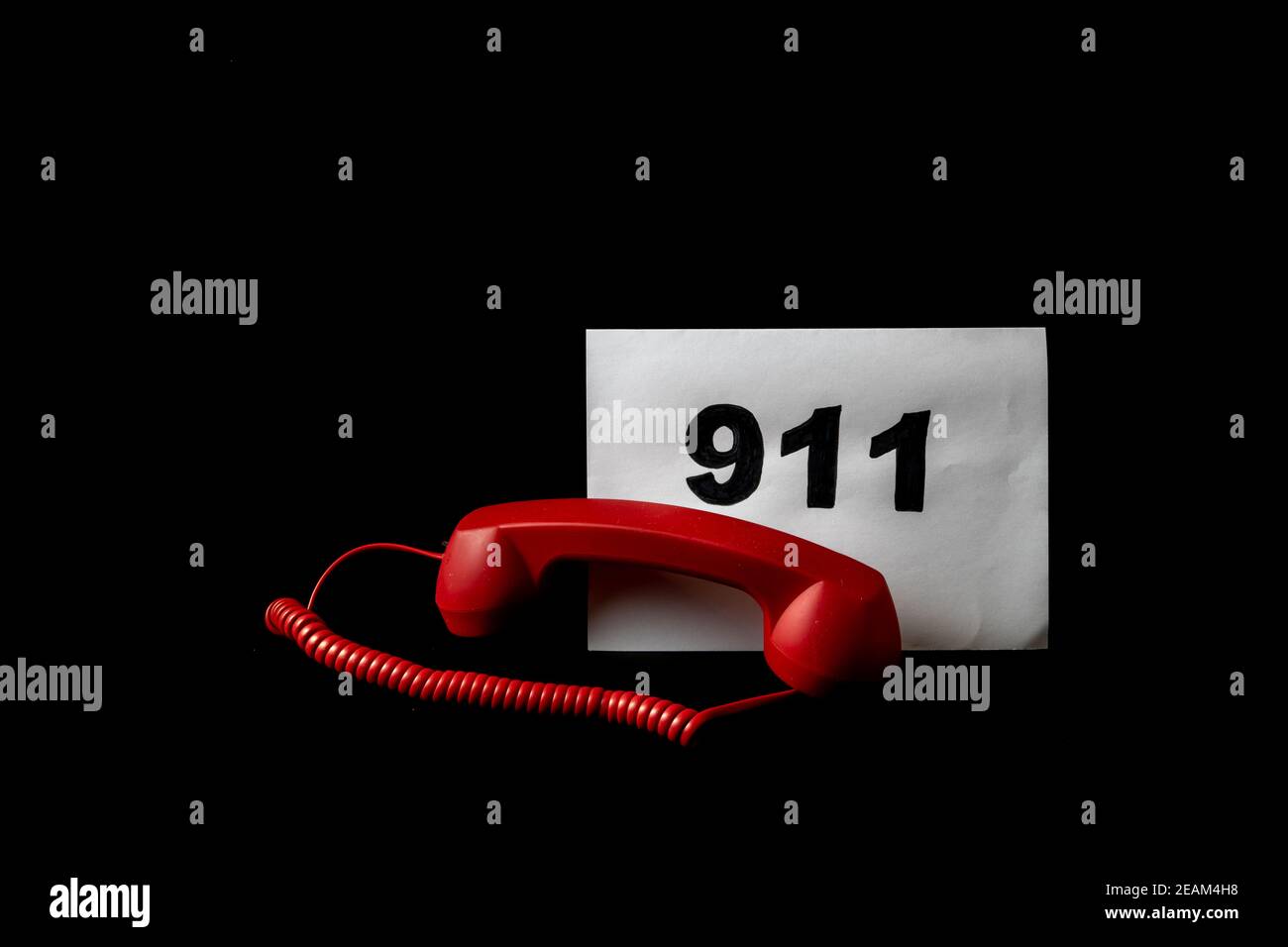 Call 911 and emergency call concept, text 911 on paper and phone ...