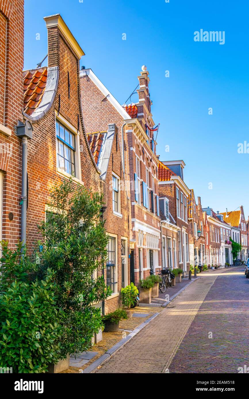 Classical red brick houses situated alongside Groot Heiligland street ...