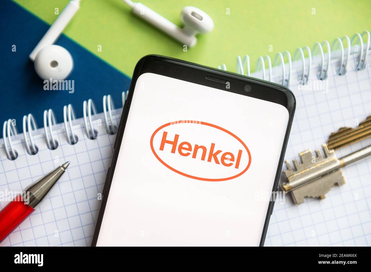 In this photo illustration, a Henkel logo seen displayed on a ...