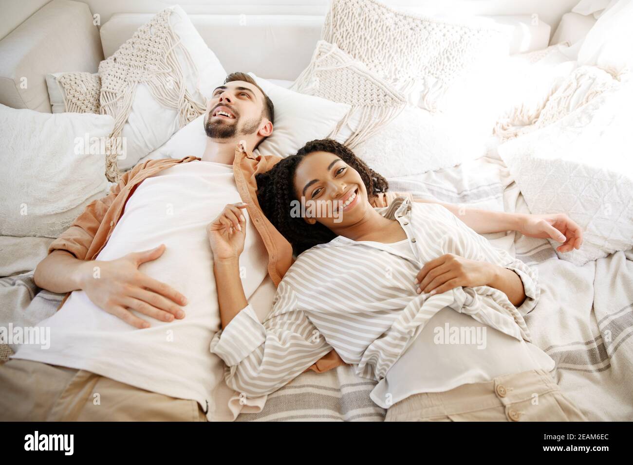 Love couple embraces in rv bed, camping in trailer Stock Photo - Alamy