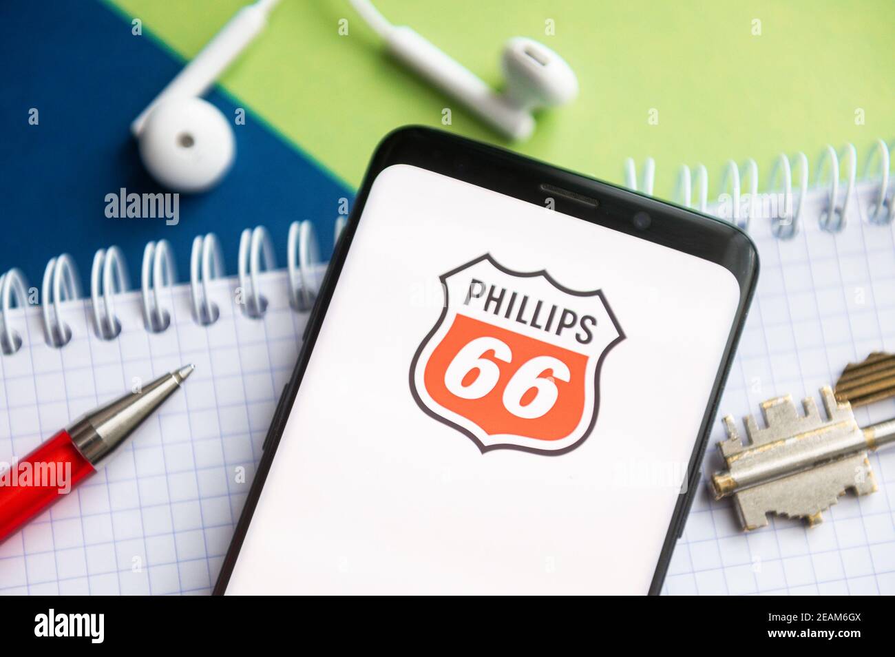 In this photo illustration, a Phillips 66 logo seen displayed on a ...
