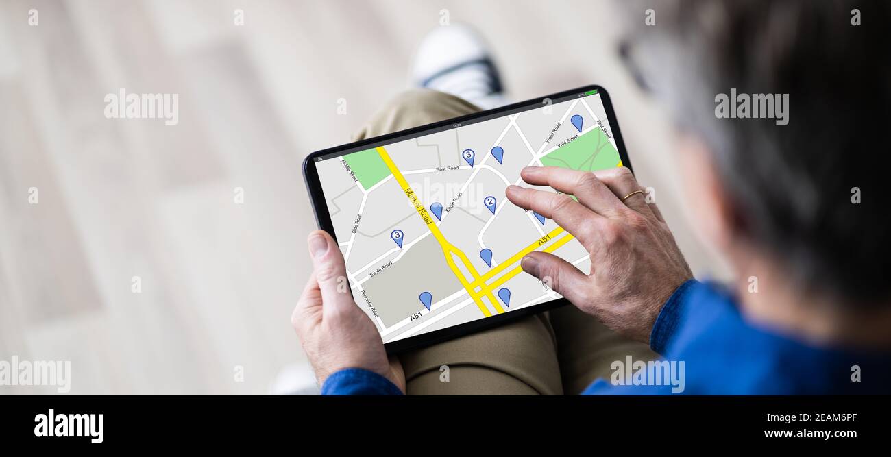 Looking Up Online GPS Location Map Stock Photo - Alamy