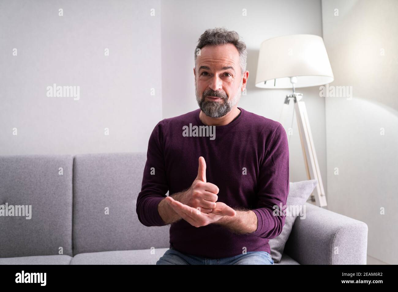 Senior Learning Sign Language Stock Photo - Alamy