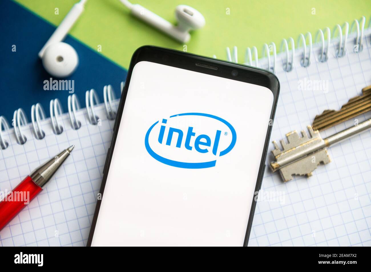 In this photo illustration, an Intel logo seen displayed on a ...