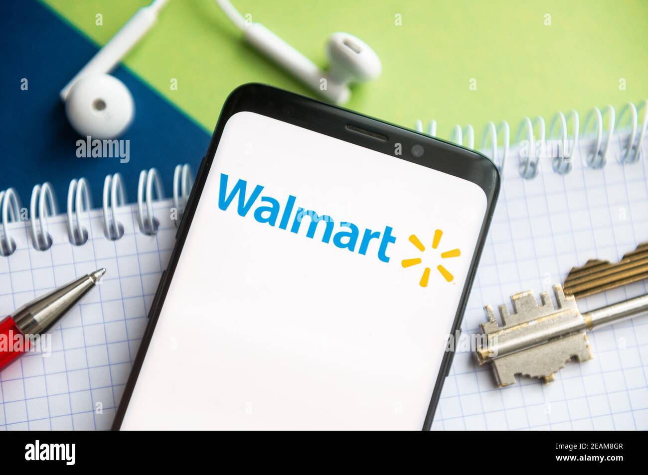 In this photo illustration, a Walmart logo seen displayed on a ...