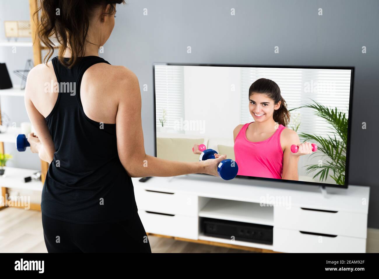 Fitness instructor watching hi-res stock photography and images - Alamy