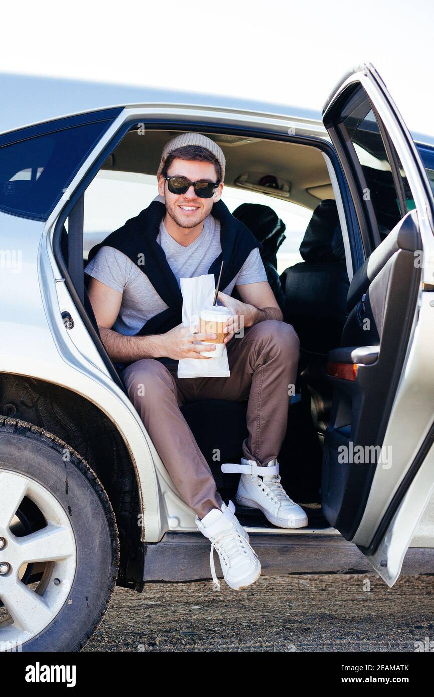 Man sitting in automobile hi-res stock photography and images - Alamy