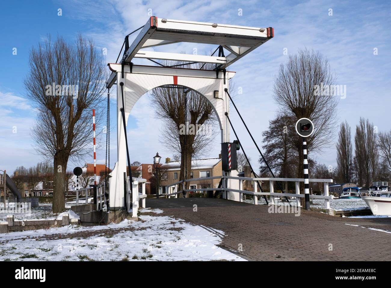 Dutch drawbridge at the entrance of the Frisian town of IJlst in the ...