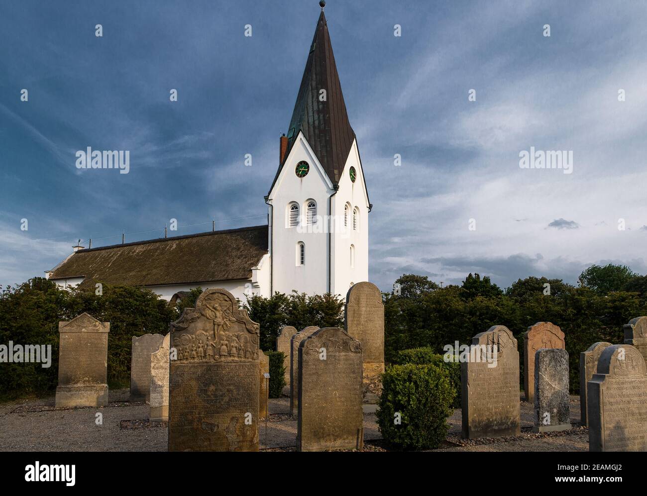 The photo shows the church in Nebel on Amrum in the evening sun Stock ...