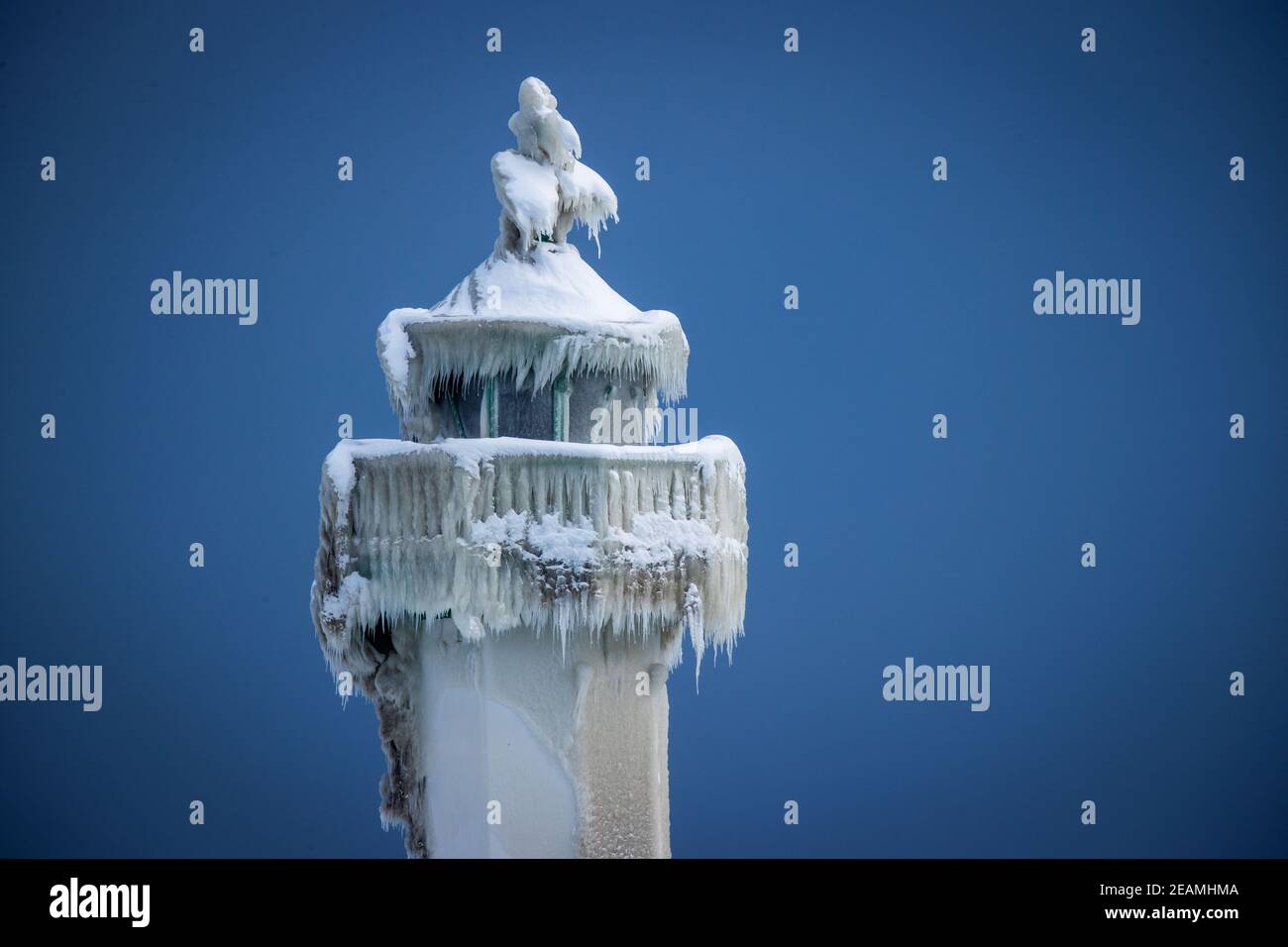 Sassnitz, Germany. 10th Feb, 2021. The icy top of the lighthouse on the ...