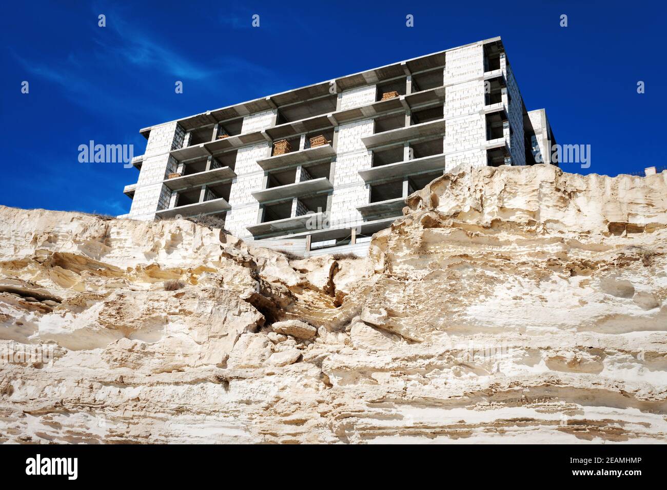 Construction of the building on the rocks Stock Photo - Alamy
