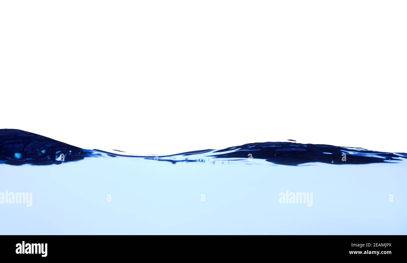 Light blue water wave with air bubbles and a little bit splashed ...