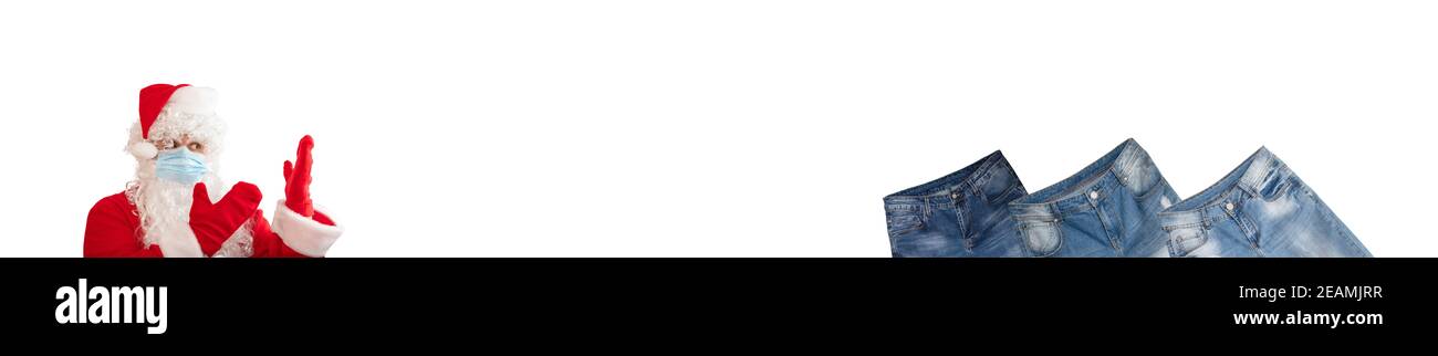 Waist and front pockets areas of three pairs of blue jeans. Santa Claus ...