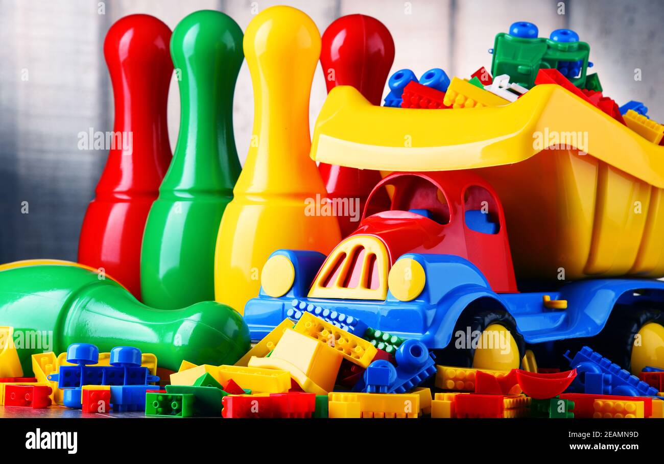 Colorful plastic toys in children's room Stock Photo - Alamy