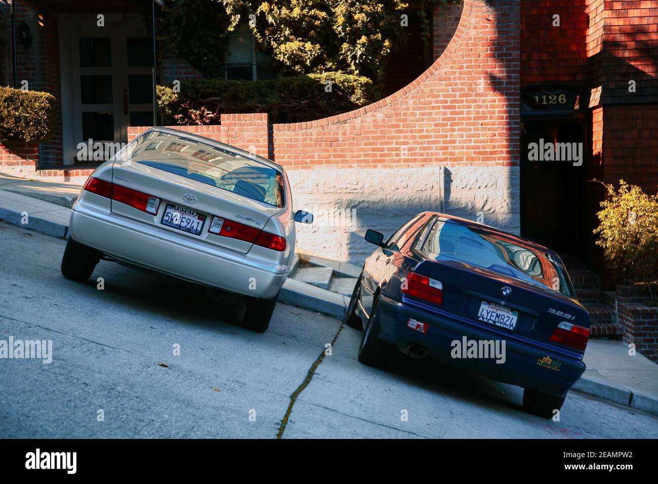 Cars parked in typical sloped streets in San Francisco Stock Photo - Alamy