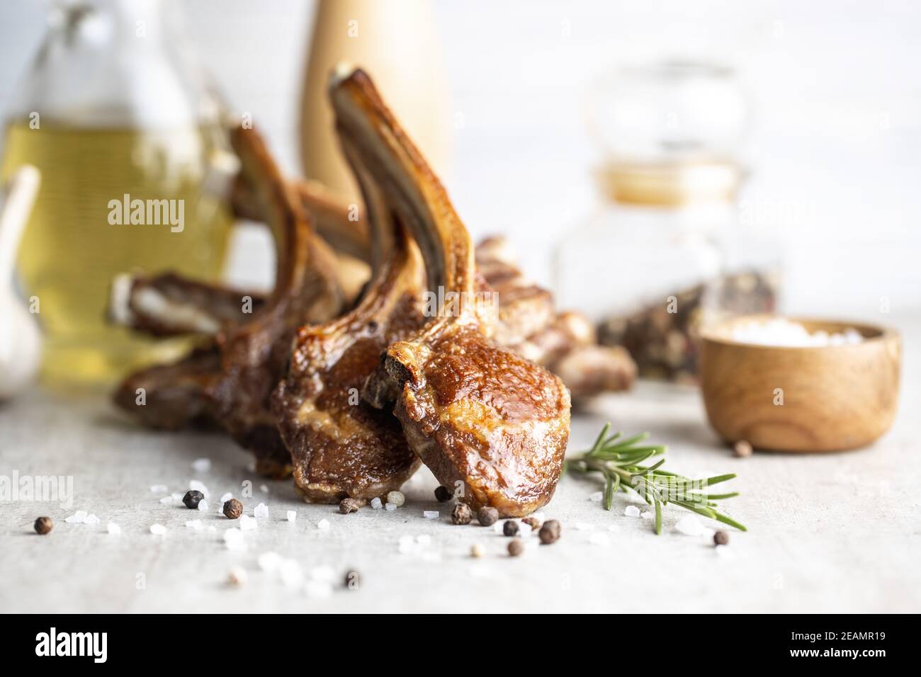 Grilled lamb chops on kitchen table Stock Photo - Alamy