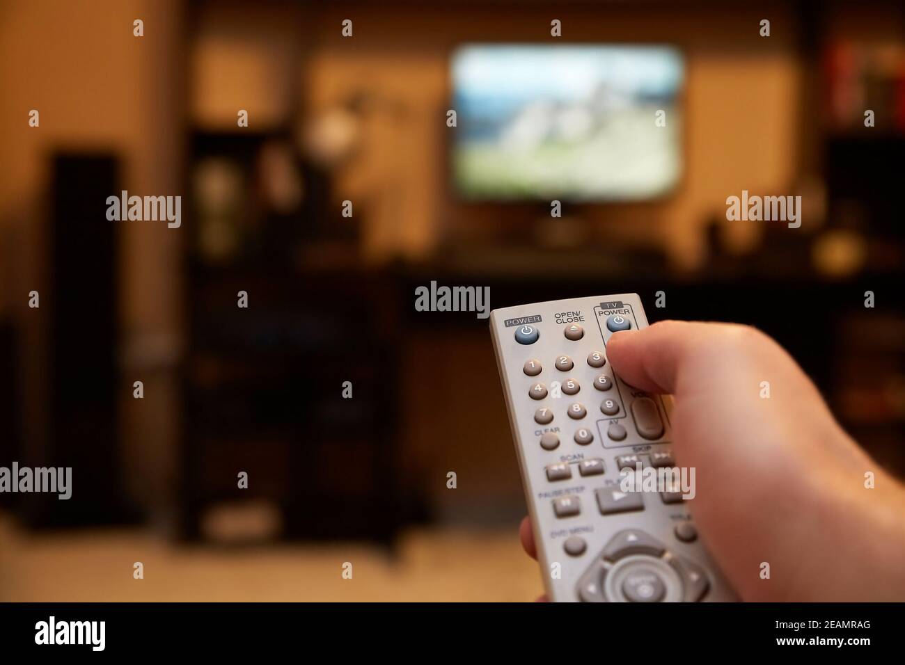 Hold remote control in hand hi-res stock photography and images - Alamy