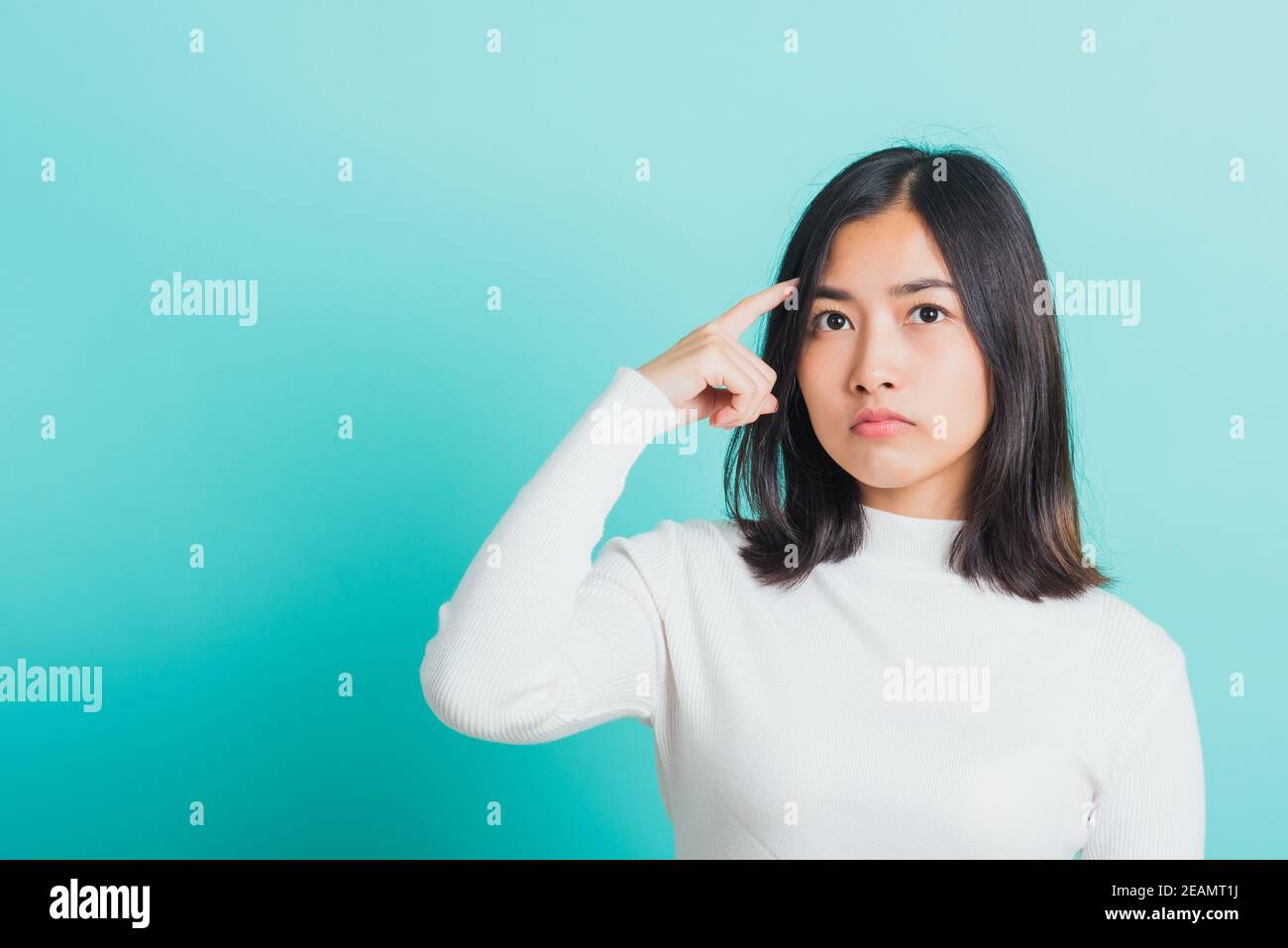 woman hand near the face and thinking Stock Photo - Alamy