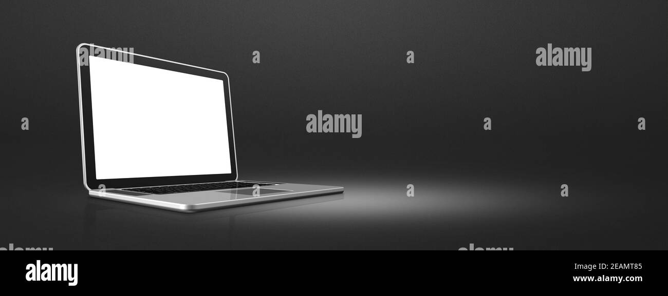 Laptop computer on black office scene background banner Stock Photo - Alamy