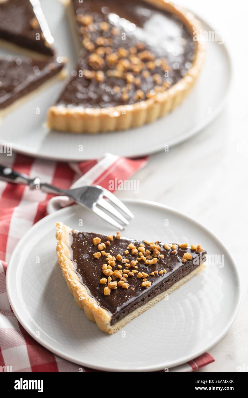 Sweet chocolate pie with crushed nuts Stock Photo - Alamy