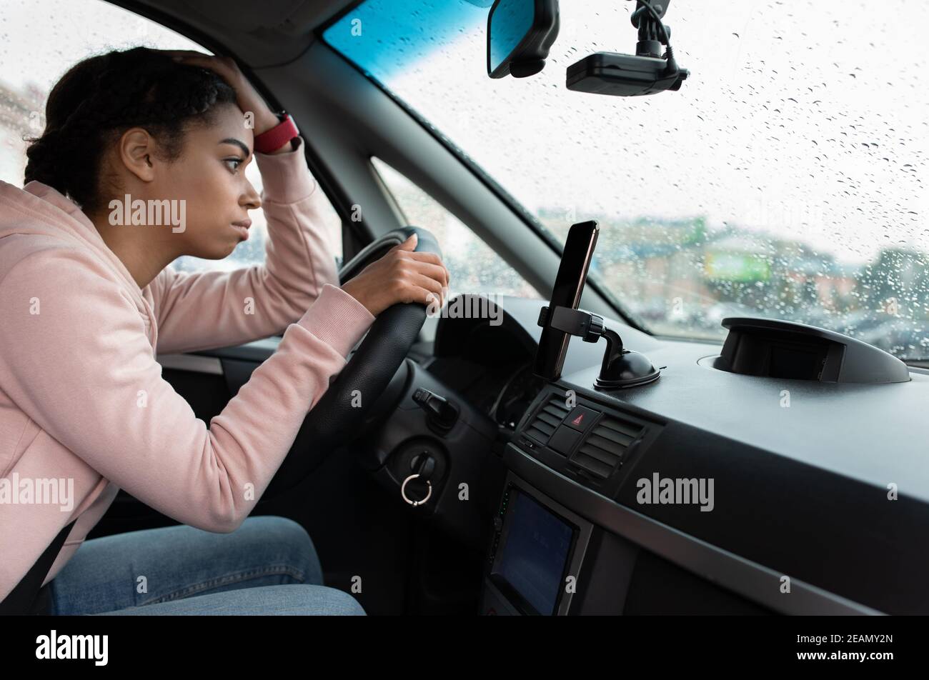 Being late for work, stuck to traffic jams in city Stock Photo - Alamy