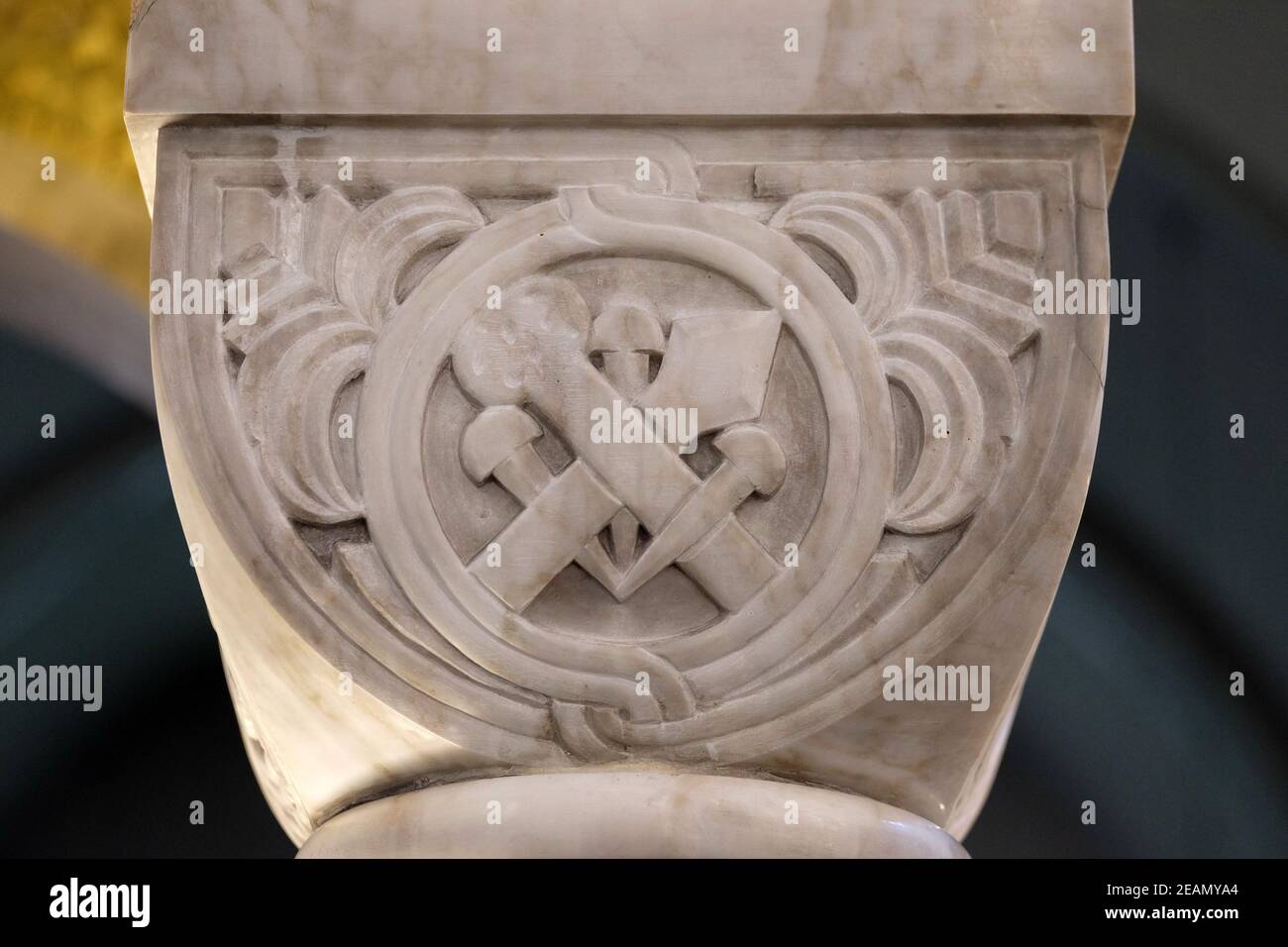 The symbol of passion of Jesus Christ on a pillar in the church of ...