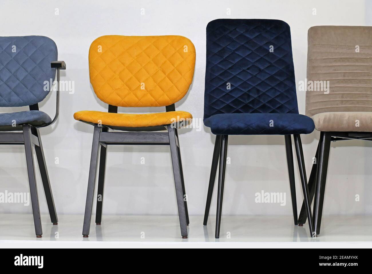 Modern textile material chairs Stock Photo - Alamy