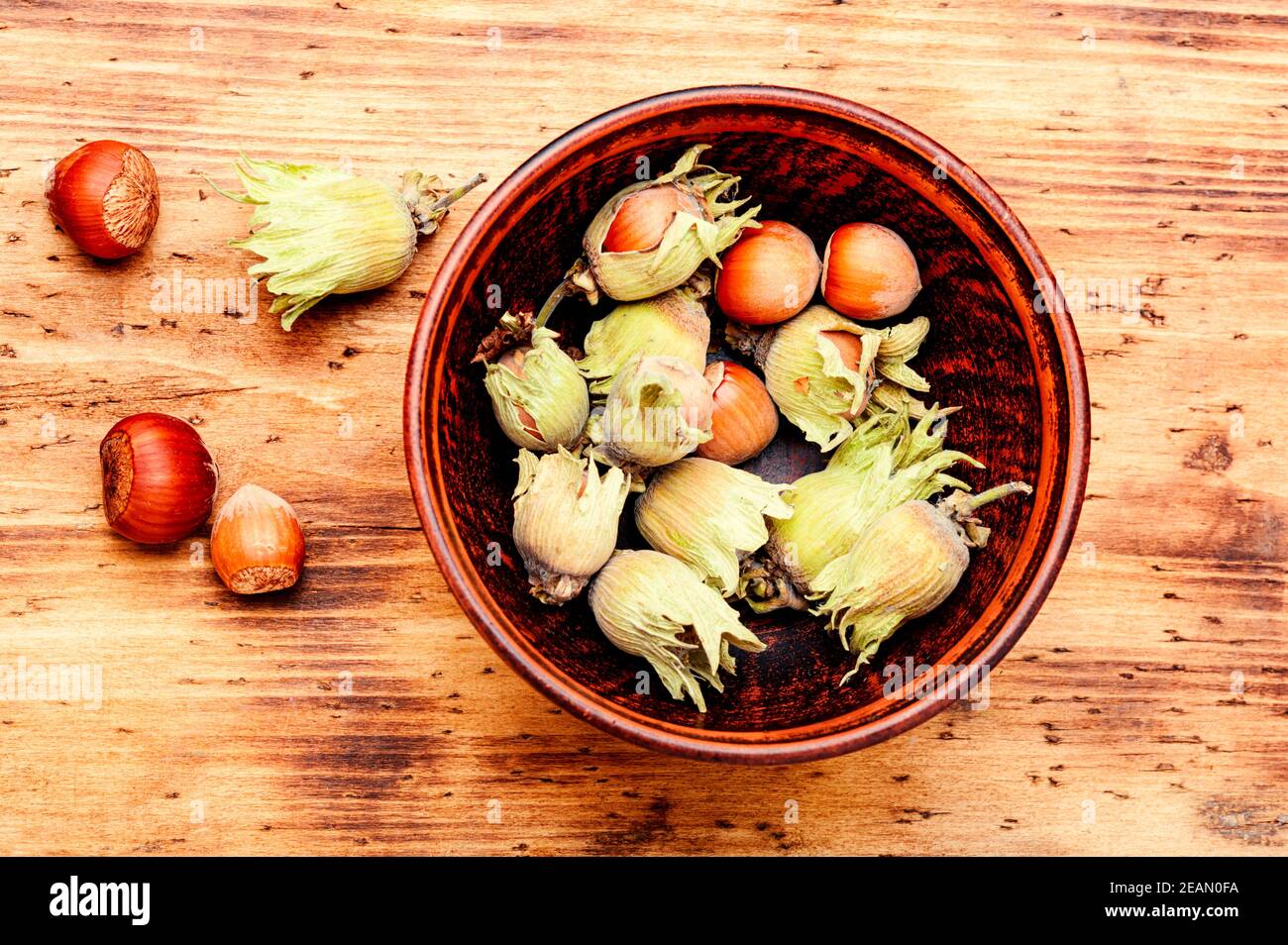 Nut in husk hi-res stock photography and images - Alamy