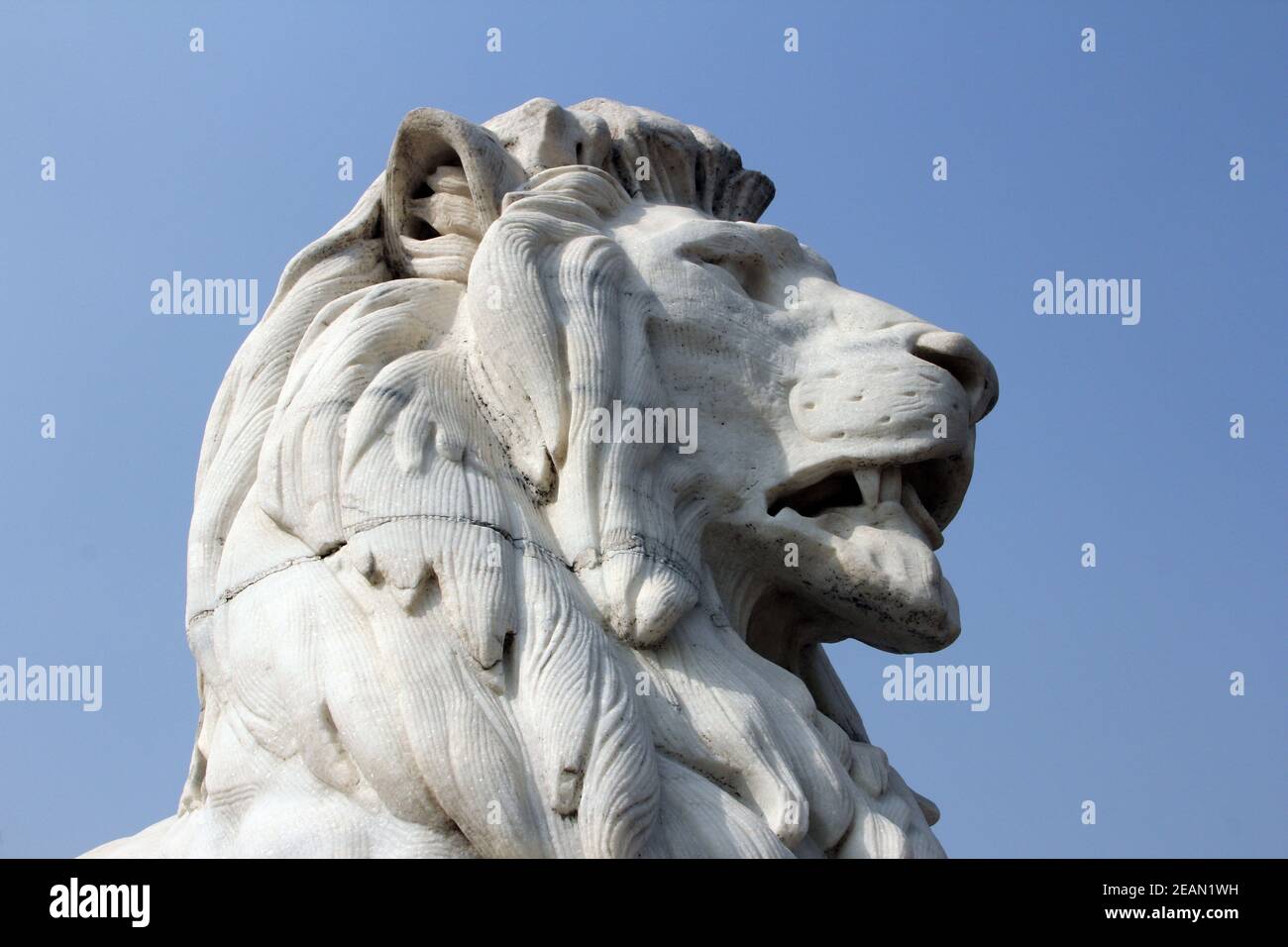 Lion Statue in sky background at Victoria Memorial Gate, Kolkata, India ...