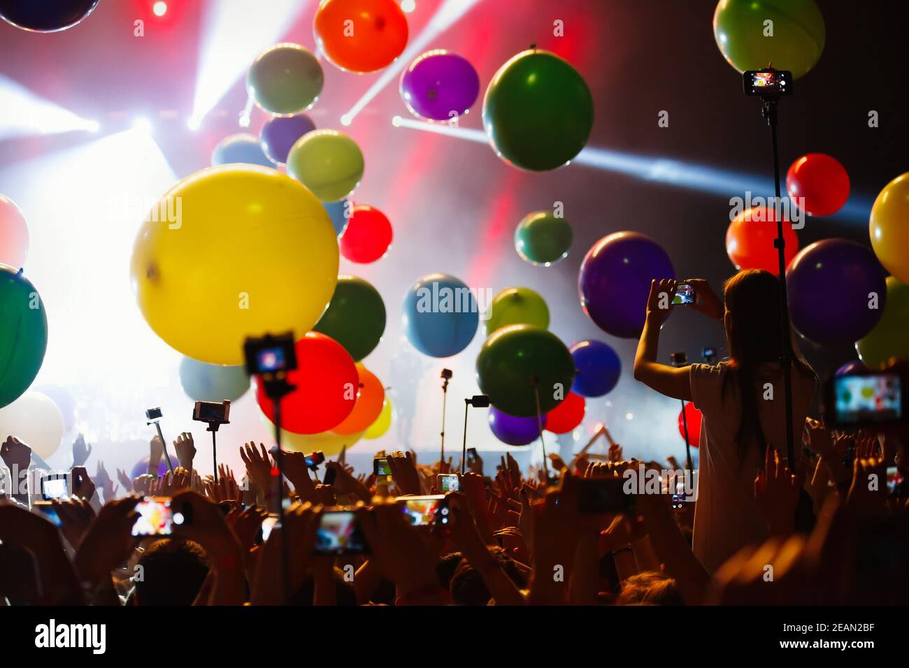 Electronic music festival in night club.Group of young people partying ...