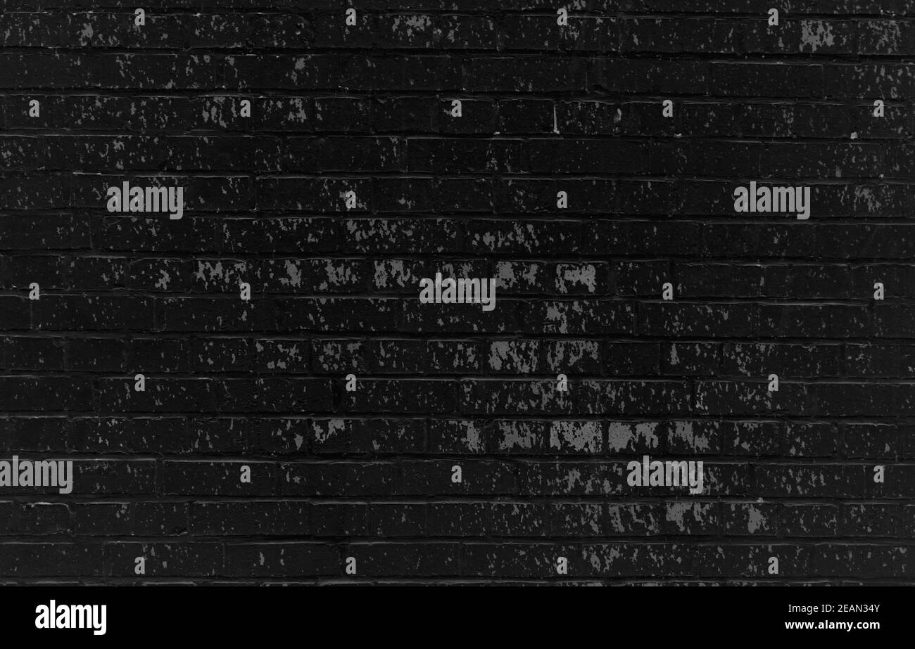 Dirty very dark black brick wall pattern Stock Photo - Alamy