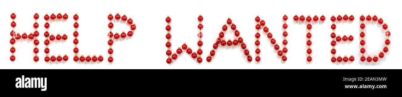 Red Christmas Ball Ornament Building Word Help Wanted Stock Photo - Alamy