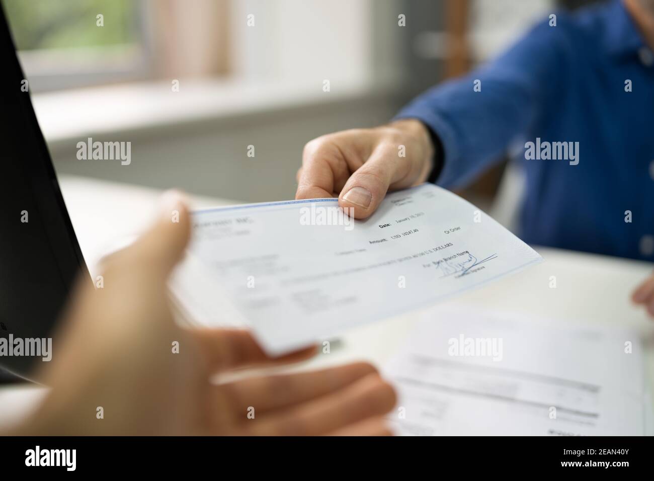 Salary cheque hi-res stock photography and images - Alamy