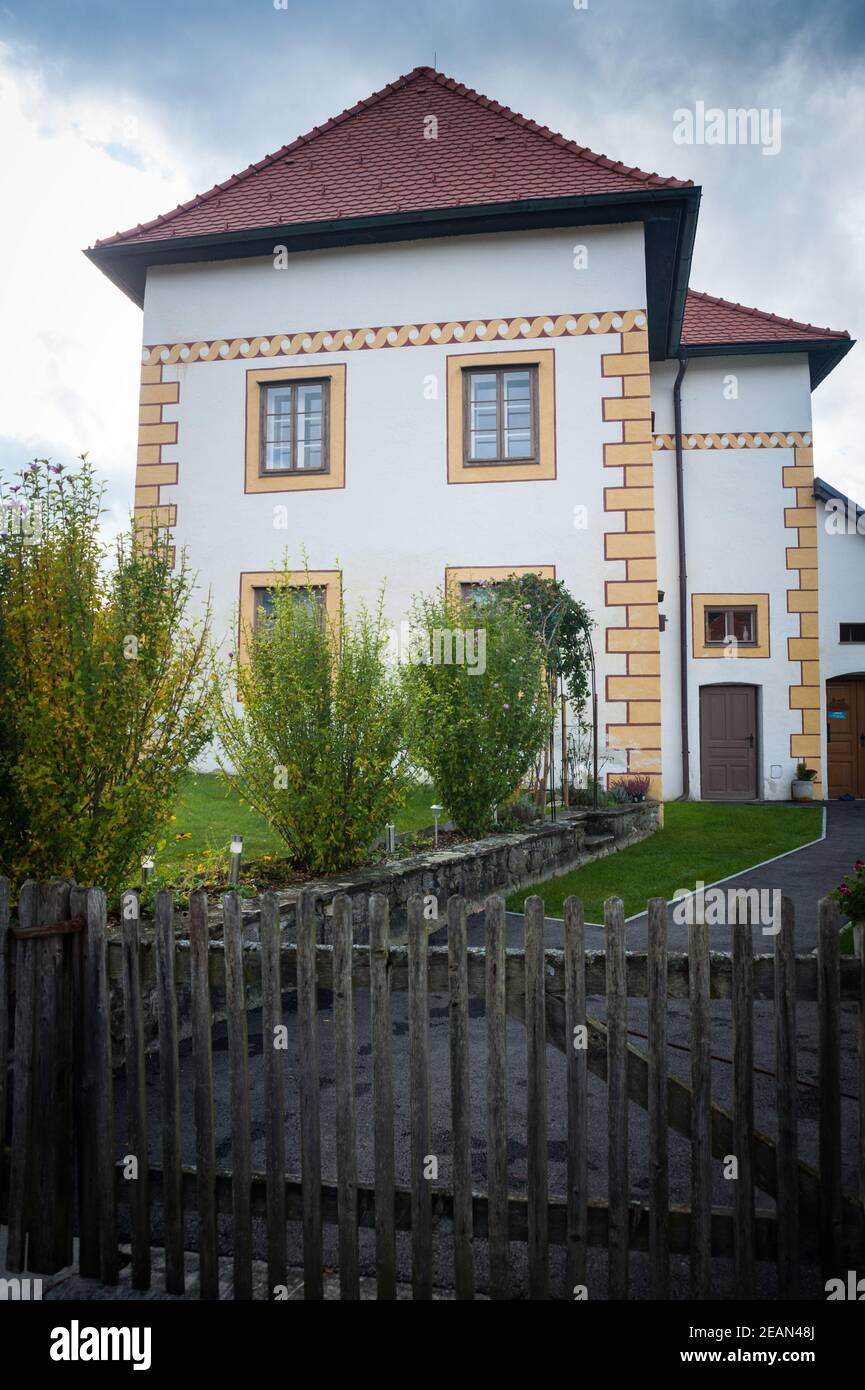 Old medieval house in Austria with wooden fence Stock Photo - Alamy