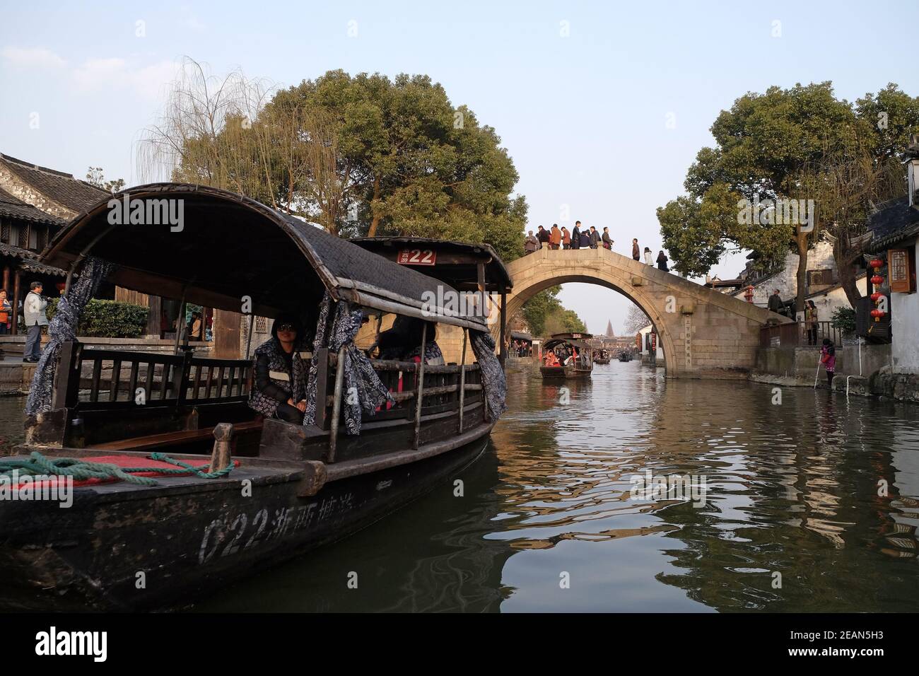 Tourist boats on the water canals of Xitang Town in Zhejiang Province ...