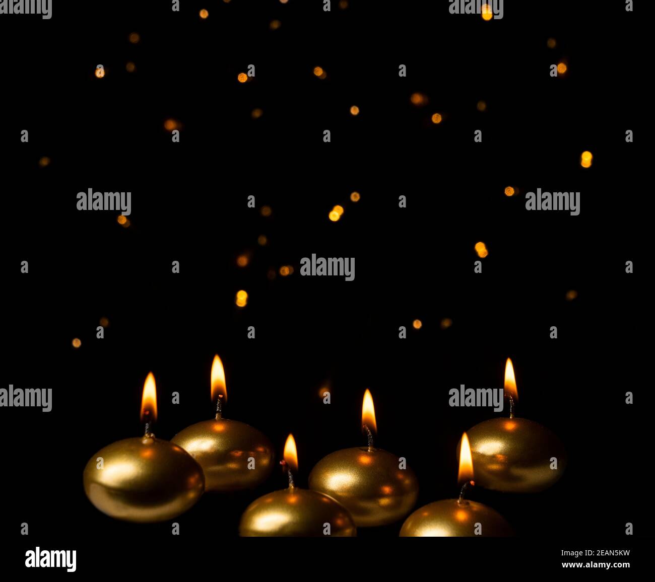 Illuminated white lit candles hi-res stock photography and images - Alamy