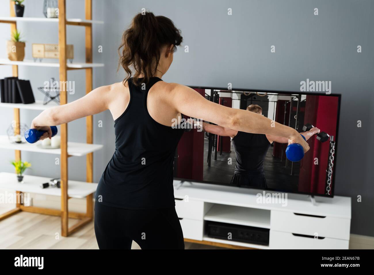 Fitness instructor watching hi-res stock photography and images - Alamy