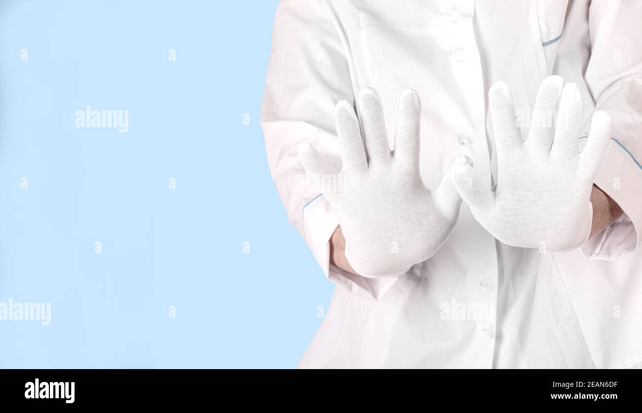 Doctor hand makes a stop sign Stock Photo - Alamy