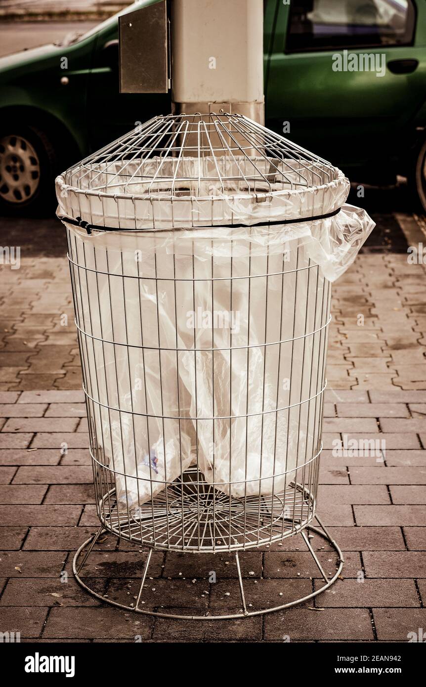 Vertical shot of a metal waste bin outdoor Stock Photo - Alamy