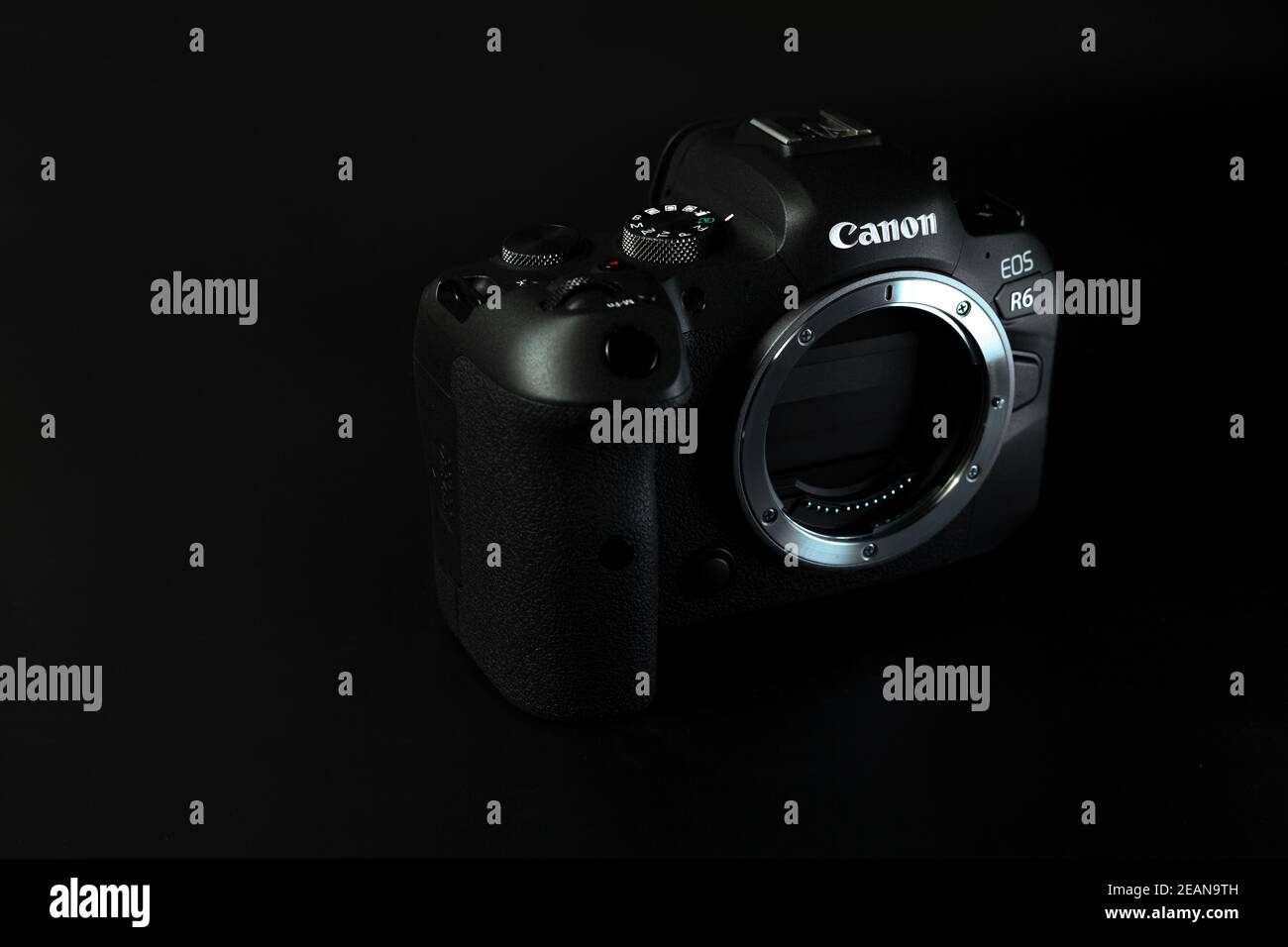 Canon r6 digital camera close-up, black background, glare Stock Photo ...