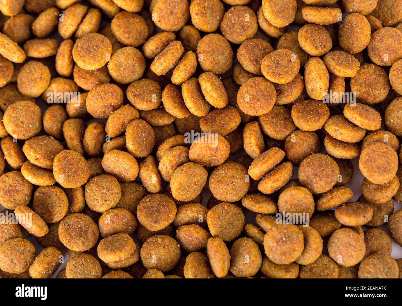 The dry pet food. isolated on white Stock Photo - Alamy