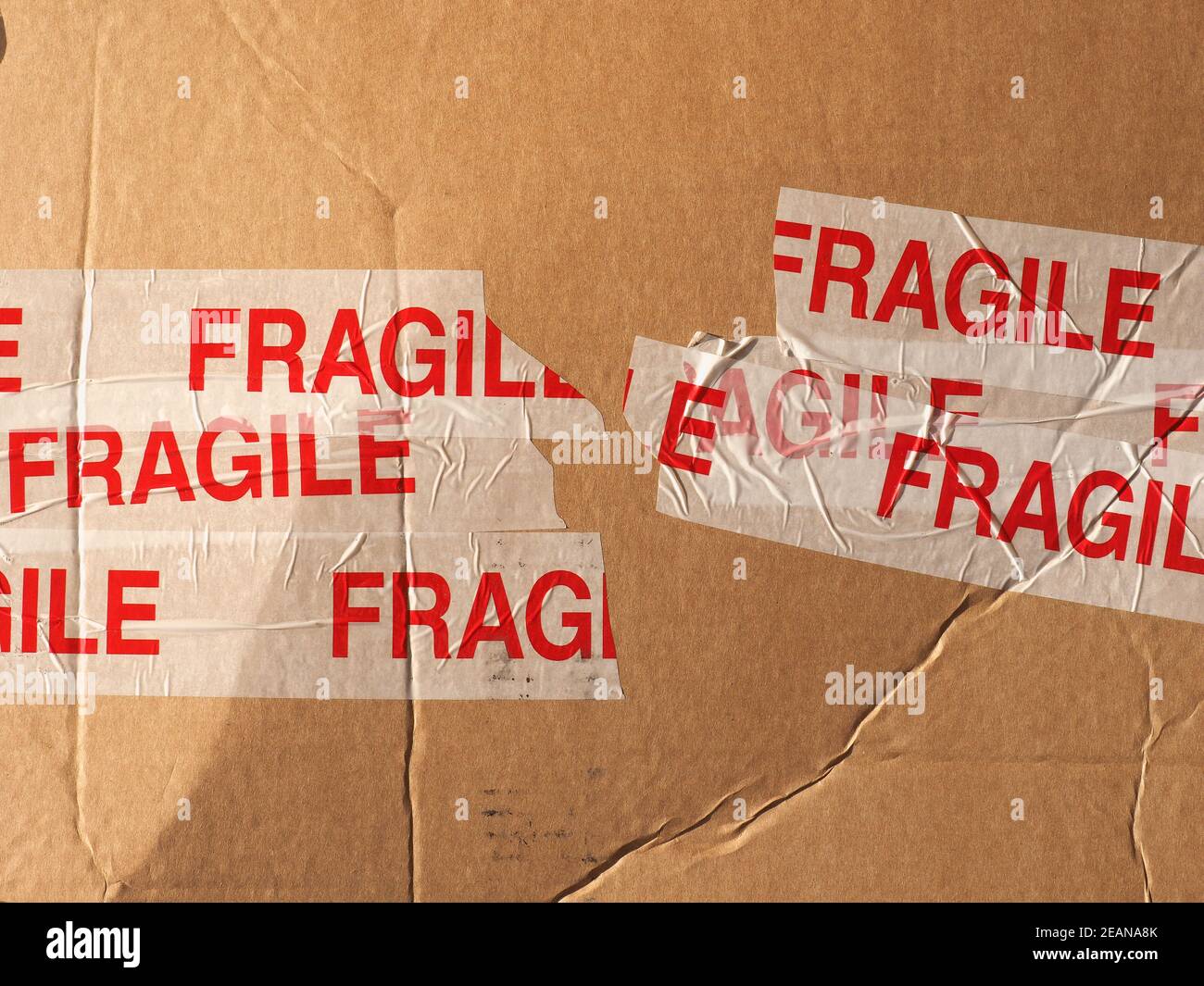 fragile on cardboard packet Stock Photo - Alamy