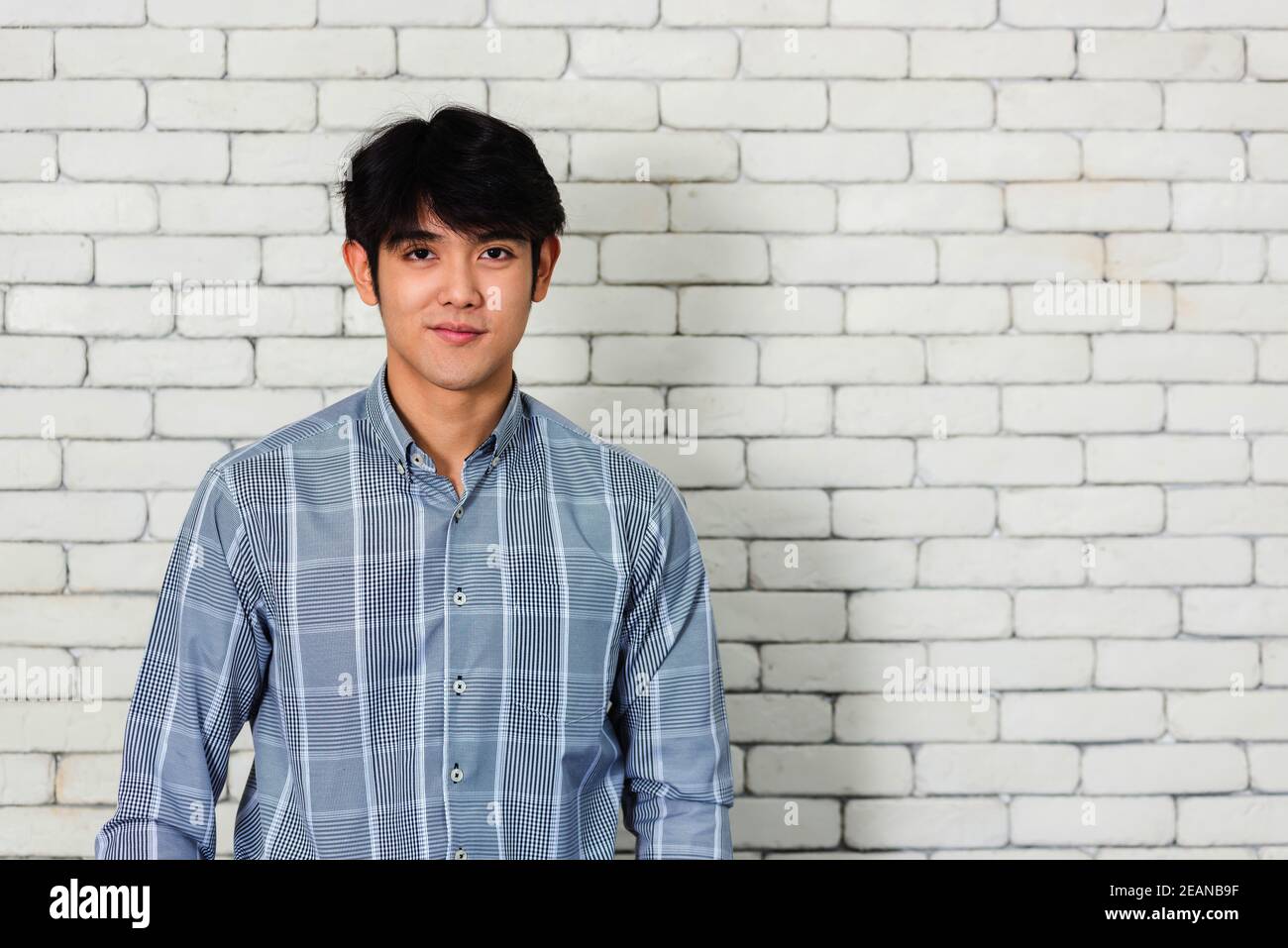 Handsome young man look camera hi-res stock photography and images - Alamy